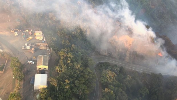 Women and children airlifted to safety with fire 'roaring' up the hill