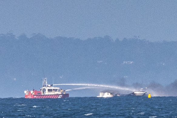 Port Phillip Bay boat fire: Two men rescued as cabin cruiser gutted by ...