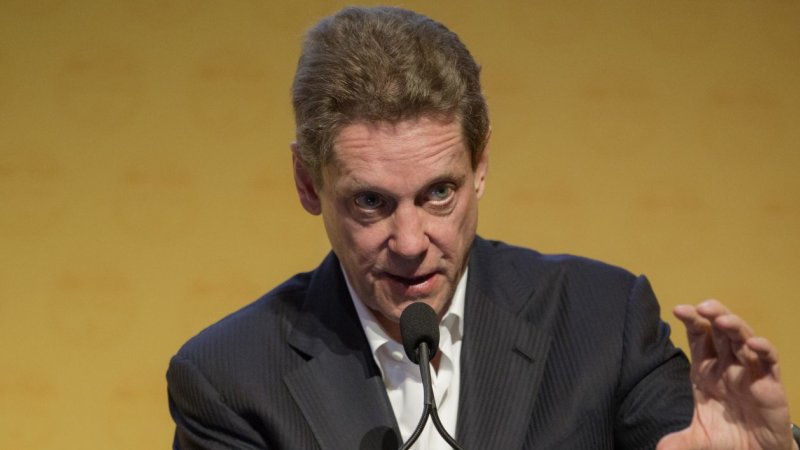 Canadian billionaire Robert Friedland takes a sip of Chalice