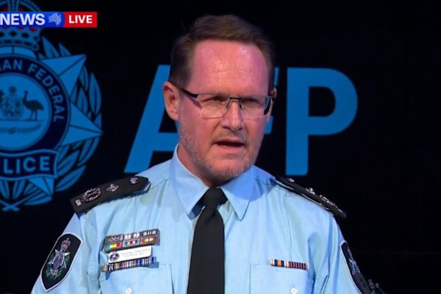 Alleged Chinese spy pleads not guilty, wins bid to hide name