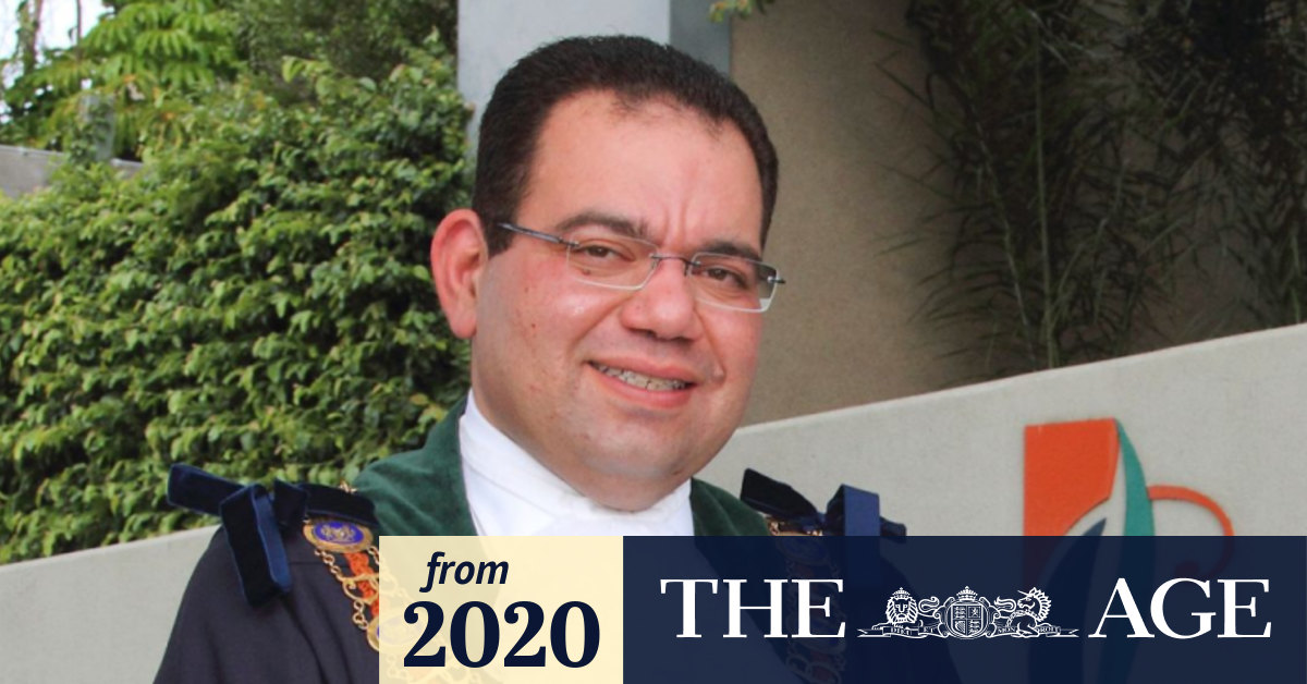 Former Casey mayor Sam Aziz returns to Australia, in Sydney hospital