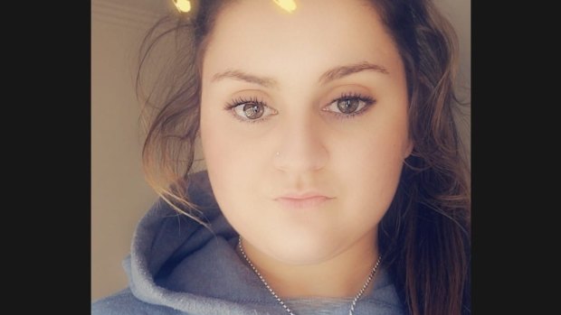 Woman accused of using car to run over, pin down police sobs in court ...