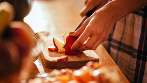 eating fruit while cutting
