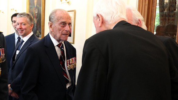 Prince Philip caught on camera swearing at photographer