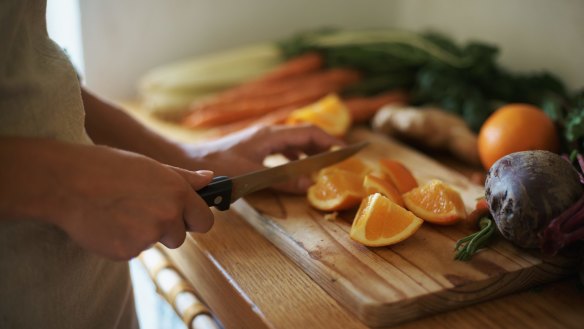 eating fruit while cutting