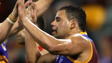 Former AFL Brisbane Lions player Albert Proud charged with attempted murder