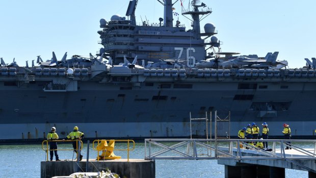 USS Ronald Reagan, with 3000 sailors on board, docks at Port of Brisbane