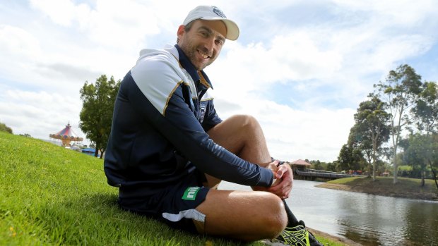 Geelong's Corey Enright celebrates his 300th game
