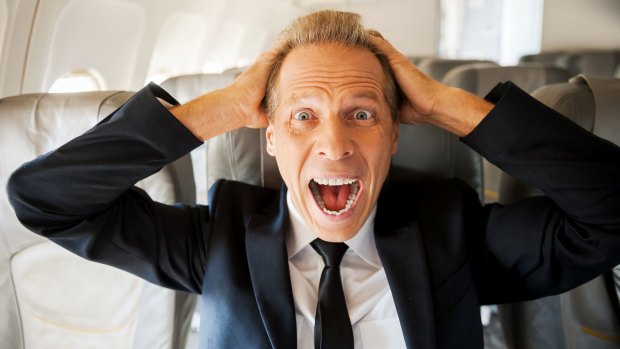 Passenger silences screaming baby on plane by screaming back