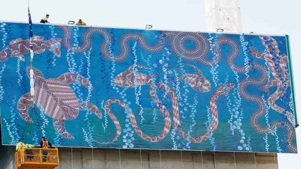 High art: The 'moving' giant painting on a skyscraper