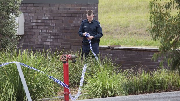 Balaclava-clad man firebombs Pakenham police station with Molotov cocktail