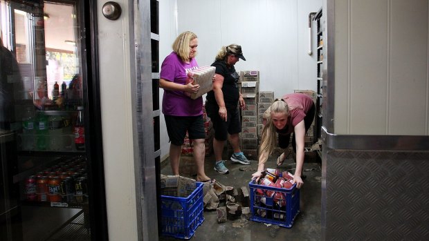 Flour bagging plan defeated by floodwaters at famous Queensland pie factory