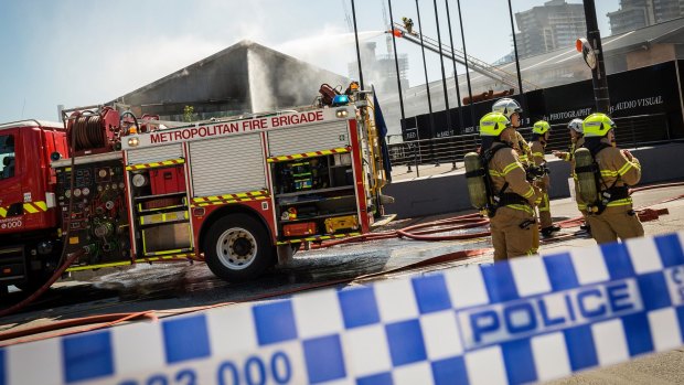 Fireys put out Docklands blaze after asbestos found in burning pub's roof