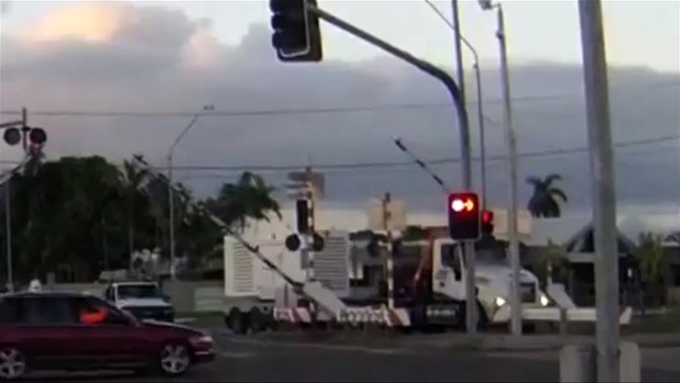 Level crossing boom gate strike prompts warning