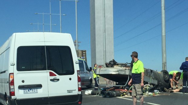 Ute upended in Bolte Bridge crash