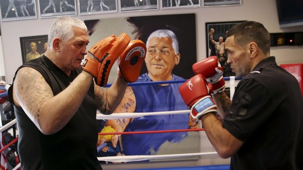 Mick Gatto trades friendly punches with Anthony Mundine