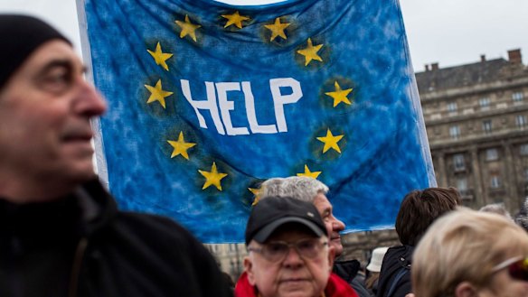 'Our Angela! Please deliver us from evil!' Hungarians rally to remind ...