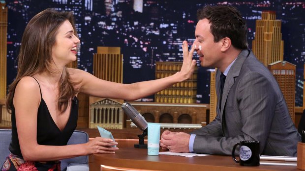 Miranda Kerr drinks beer during bizarre Jimmy Fallon interview