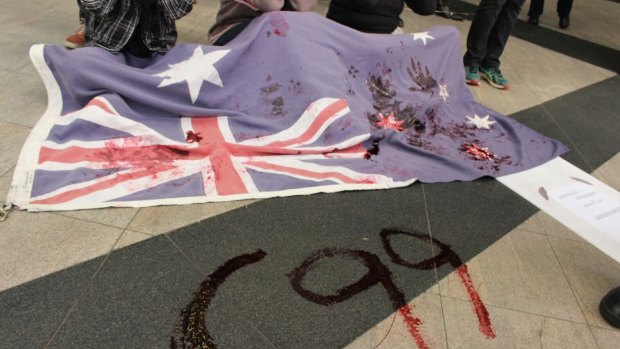 'Blood' painted on Immigration office building in Brisbane