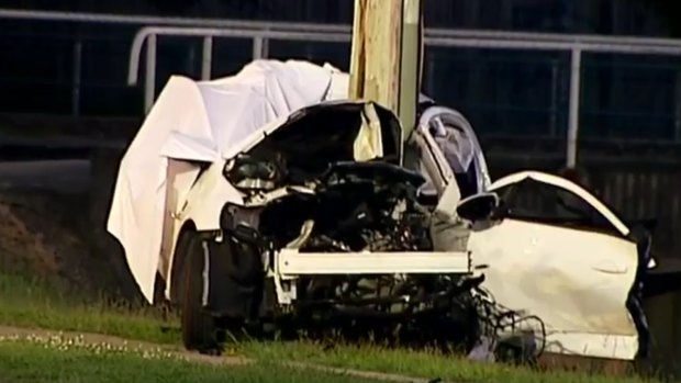 Car wrapped around power pole after horrific fatal crash north of Brisbane
