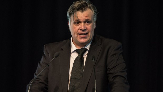 Hundreds gather to farewell football writer Michael Cockerill