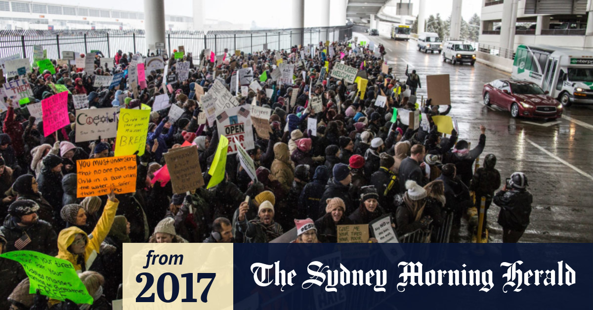 Signs from the Muslim ban protests double as prayer mats