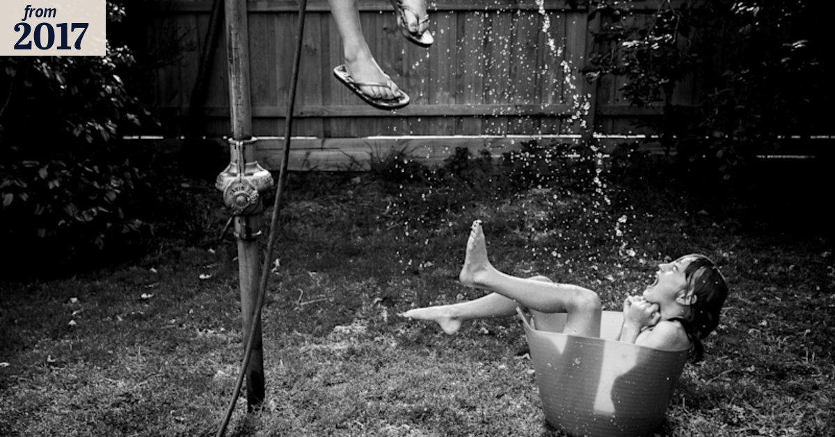 Children playing with the ‘poor man’s pool’ this month’s Clique winner