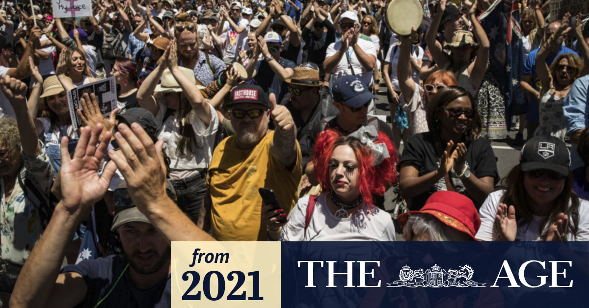 Protesters attend the Melbourne Freedom rally in the CBD