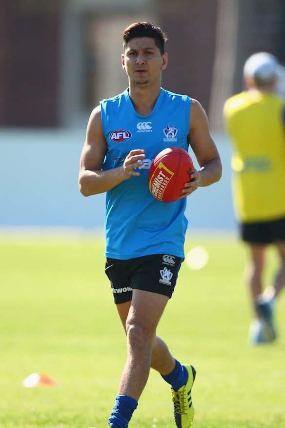 North Melbourne's Robin Nahas handles pressing matters