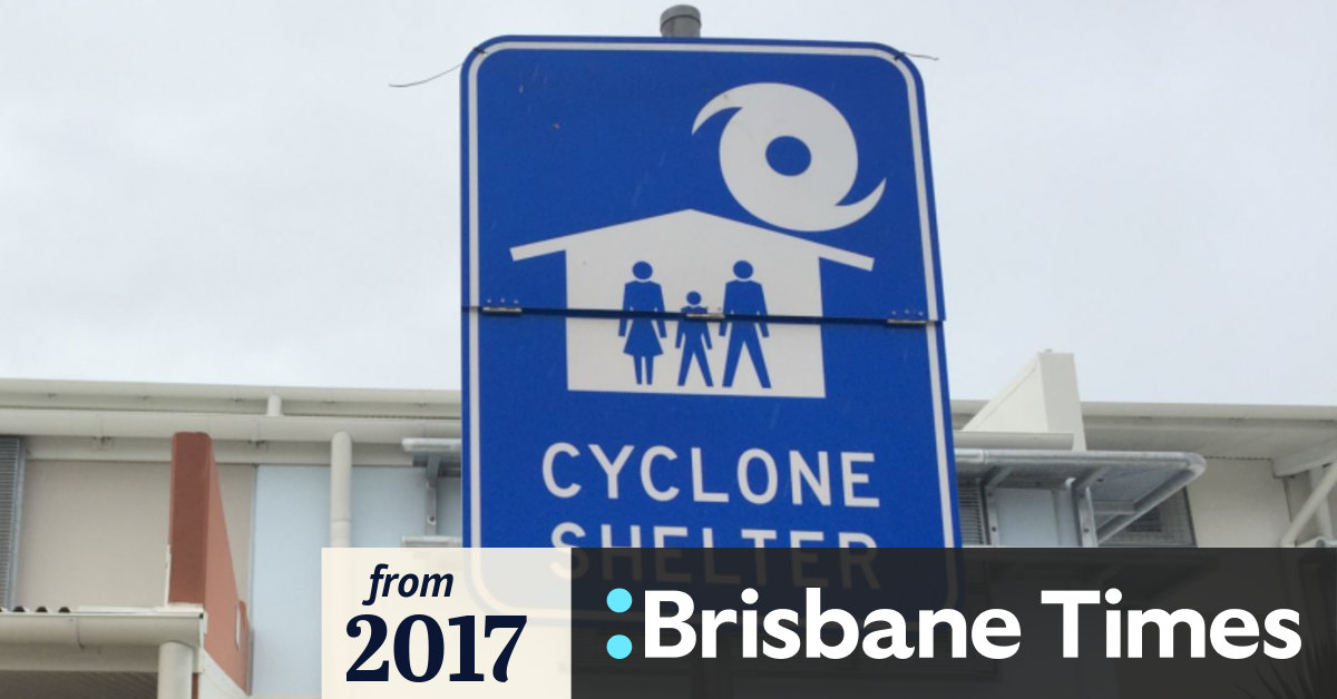 Backpackers and Bowen residents take shelter as Cyclone Debbie approaches