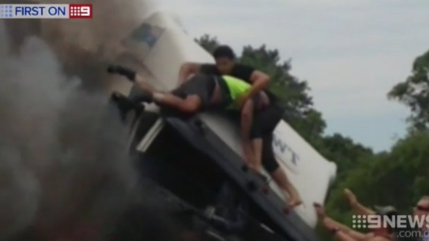 M1 truck crash: Man hailed hero after pulling driver free