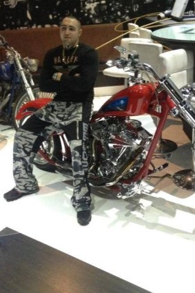 Bikie associate spared conviction over police assault