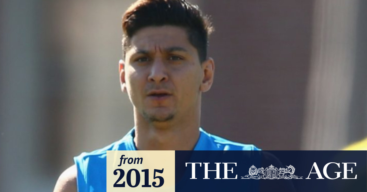 North Melbourne's Robin Nahas handles pressing matters