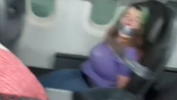 woman duct taped to seat