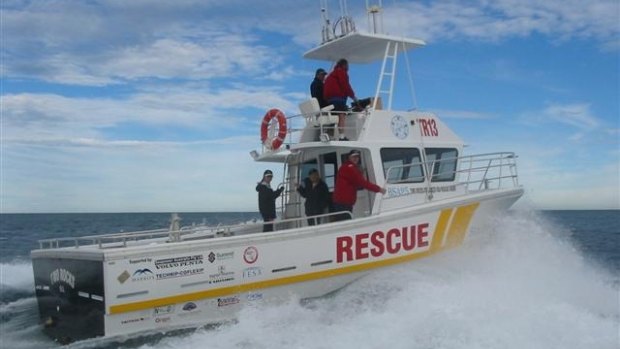 Three men rescued from sinking boat off WA coast