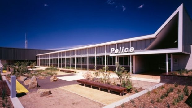 Balaclava-clad man firebombs Pakenham police station with Molotov cocktail