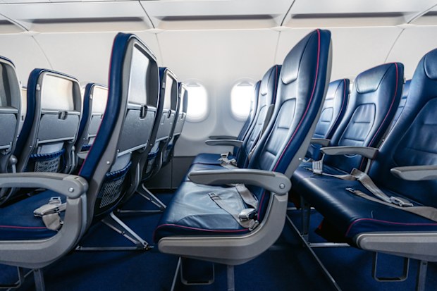 The real reason why plane windows don't line up with the seats | Nine ...
