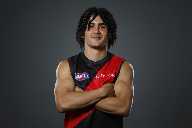 Tears as Bombers draftee shares moment with sister