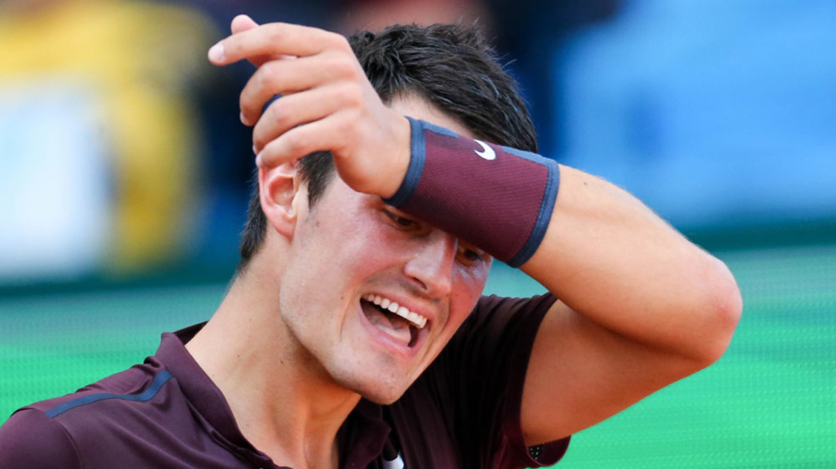 Tomic retires eight minutes into match