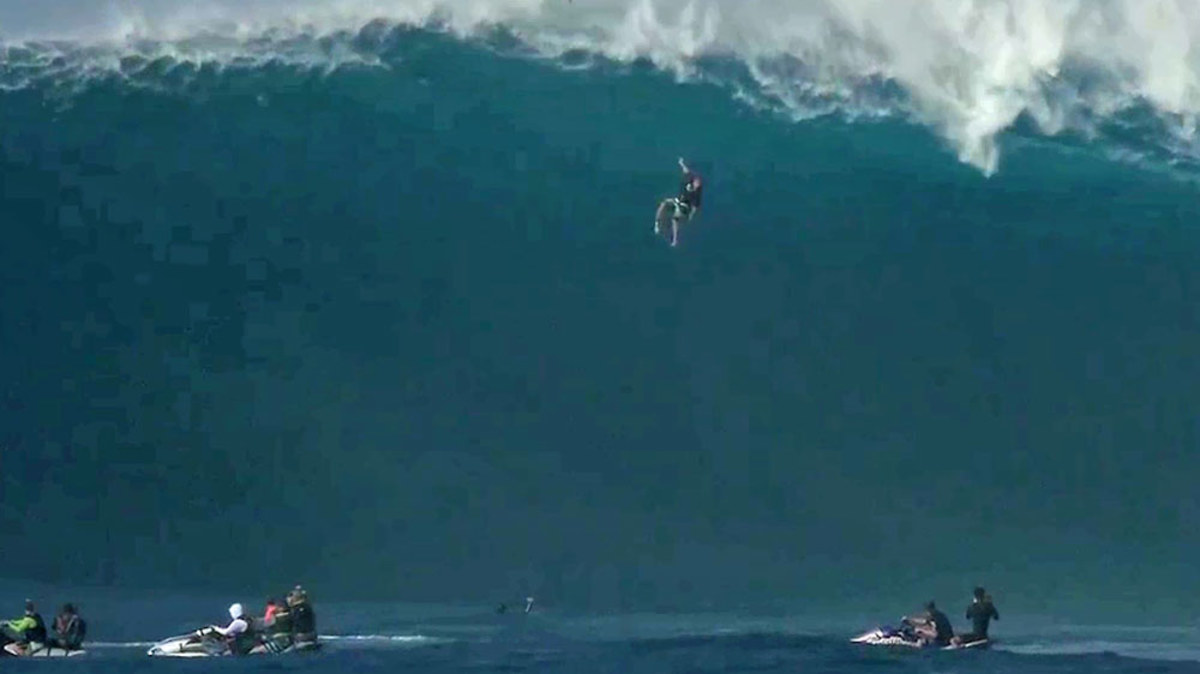 Surfer survives massive wipeout at 'Jaws'