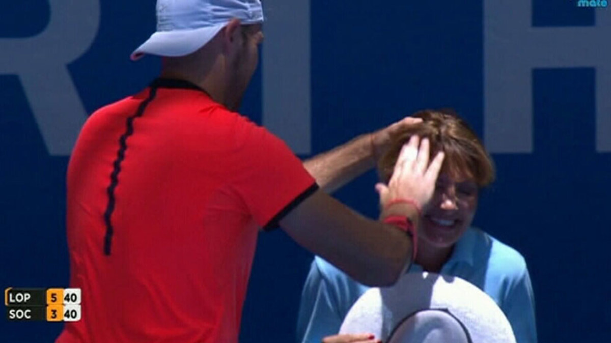 Sock kisses line judge after she was hit by serve