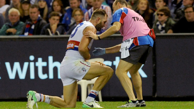 Travis Cloke injured in Western Bulldogs' Good Friday AFL win over ...
