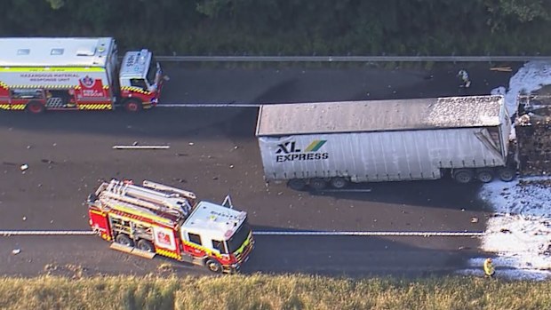 Car crash Campbelltown: Truck engulfed in flames, one driver dead after ...