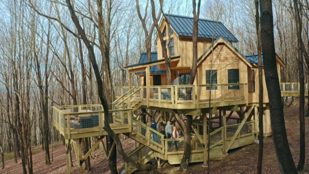 Parents drop $600k on luxury three-storey treehouse - with one very ...