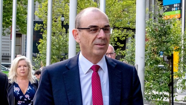 APRA's Wayne Byres under fire as he admits overcharging is common