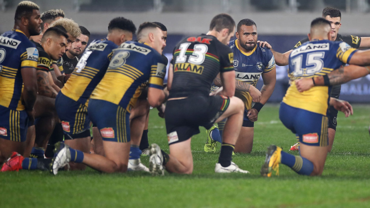 NRL, AFL teams defend players BLM protest against angry fans