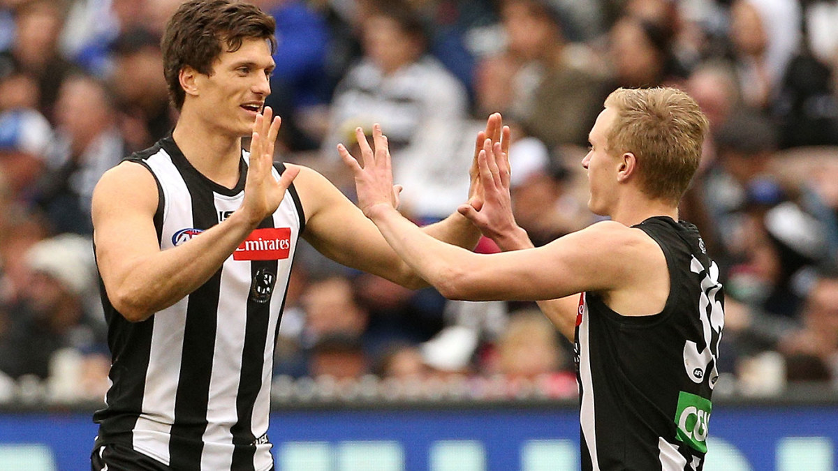 AFL: Youngsters shine as Magpies book finals berth with Kangaroos ...