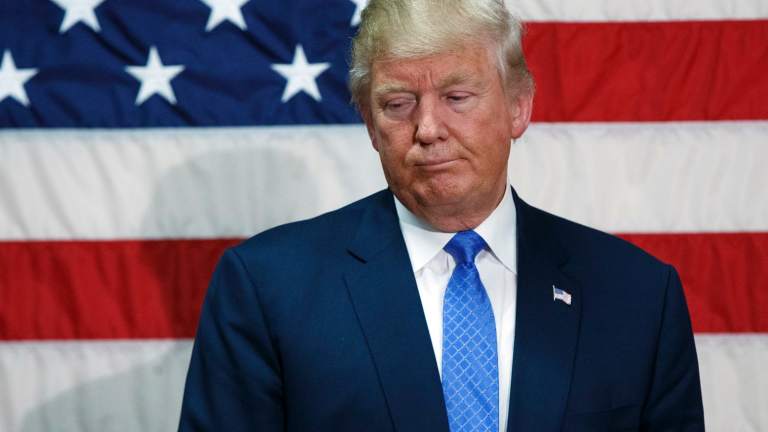 The mystery of Donald Trump's suits solved