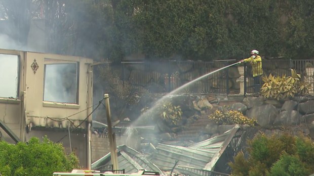 NSW bushfires: Strong winds whip up fire south of Newcastle as ...