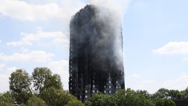 Theresa May orders public inquiry into London tower fire as death toll ...